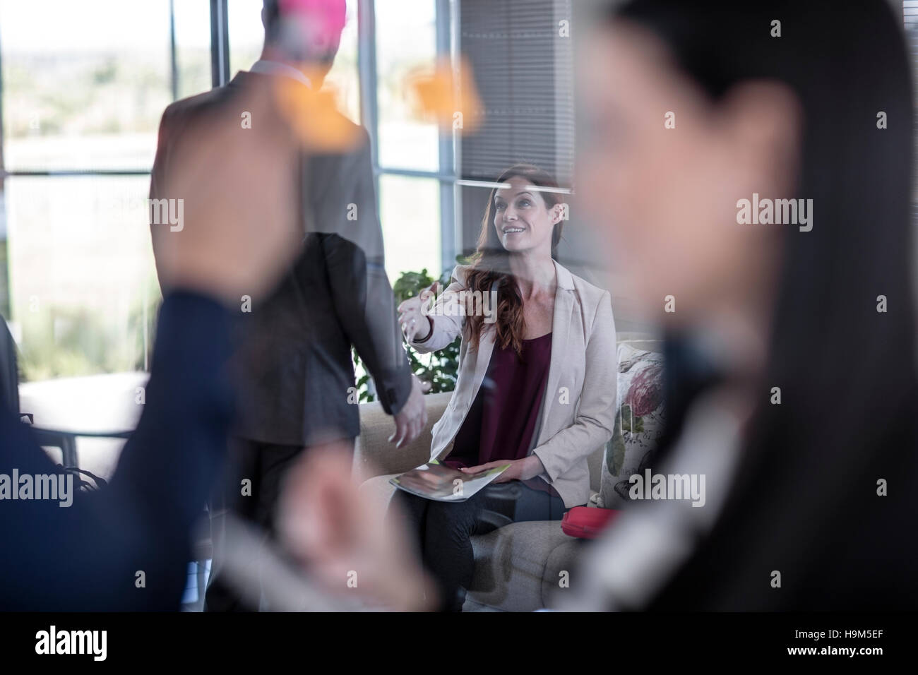 Business people greeting at meeting Stock Photo - Alamy