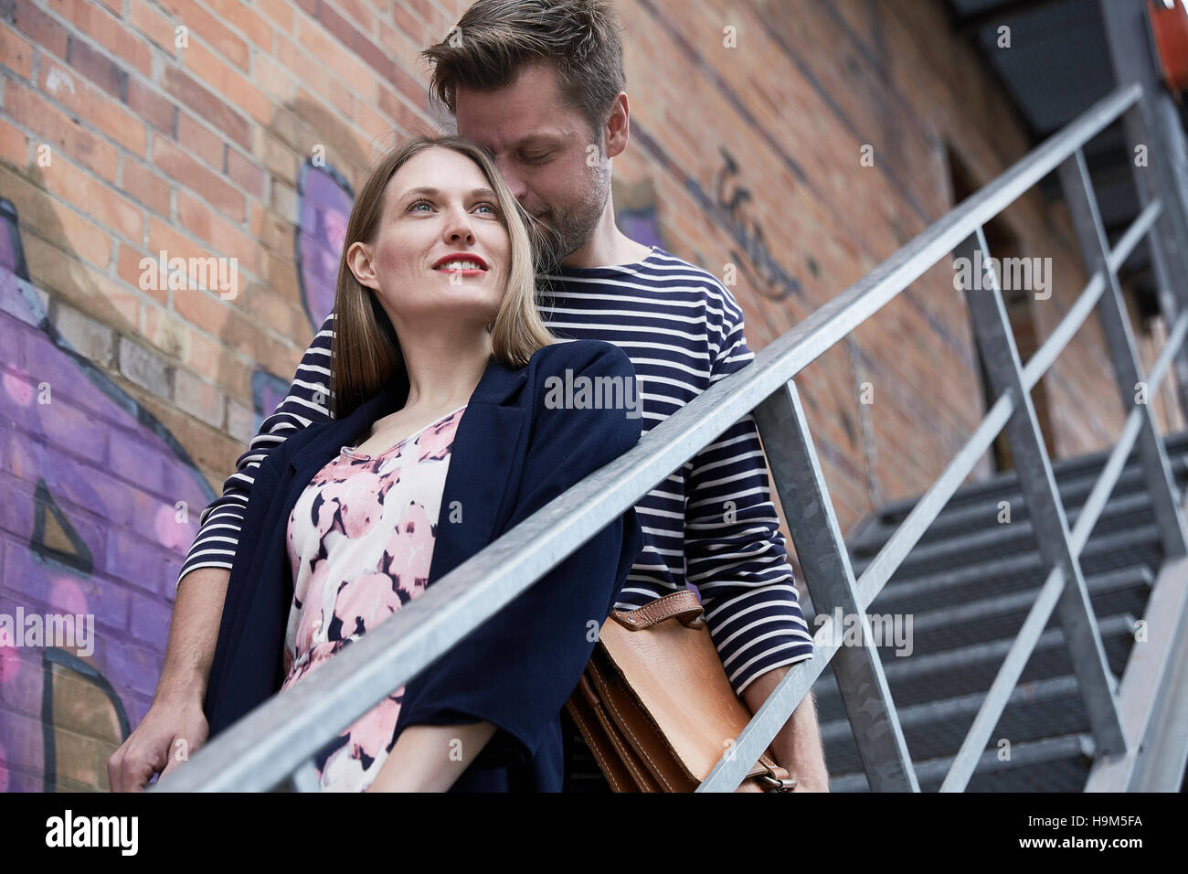Couple on stairs outdoors Stock Photo - Alamy