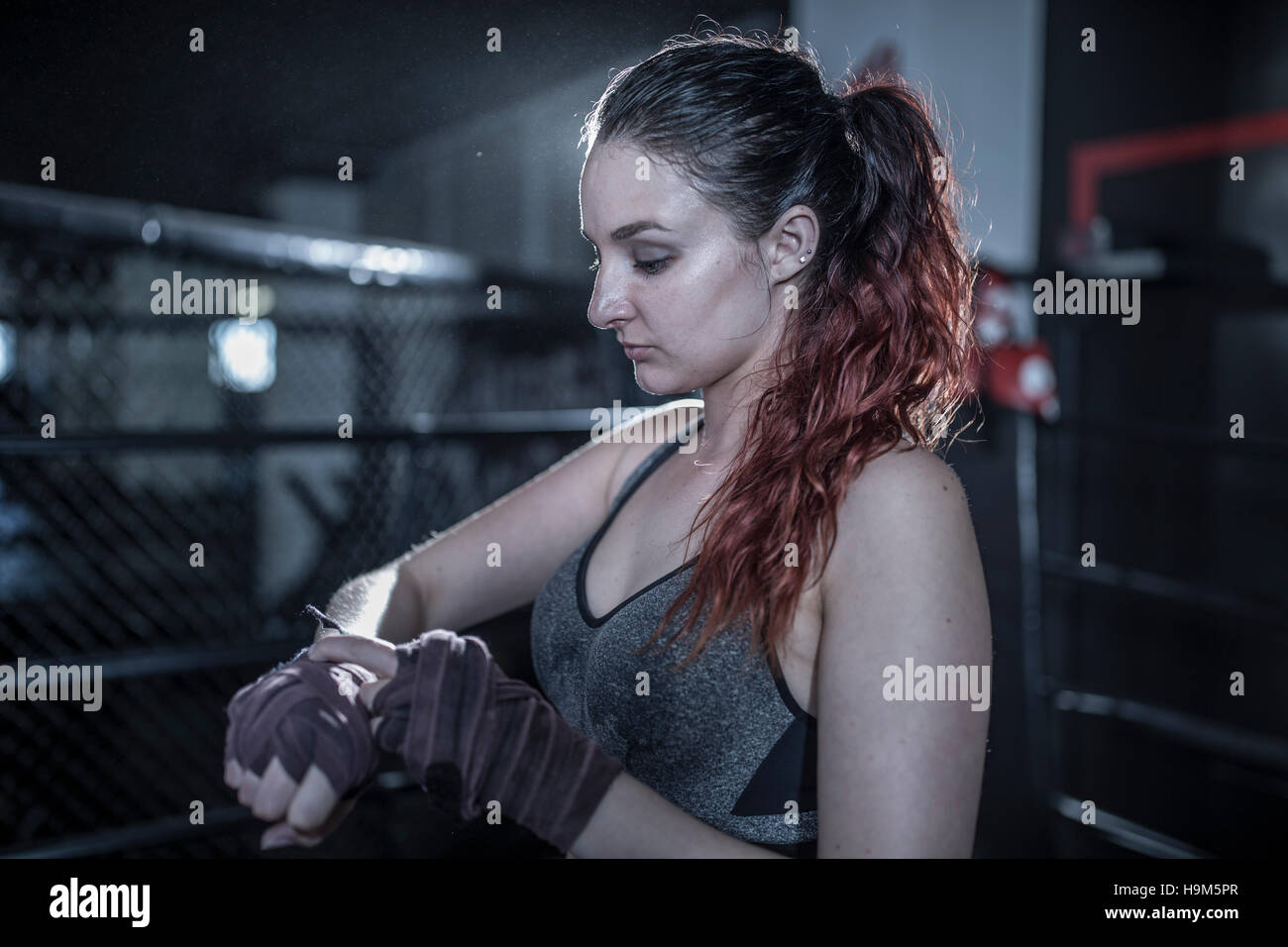 Female boxer in boxing ring Stock Photo - Alamy