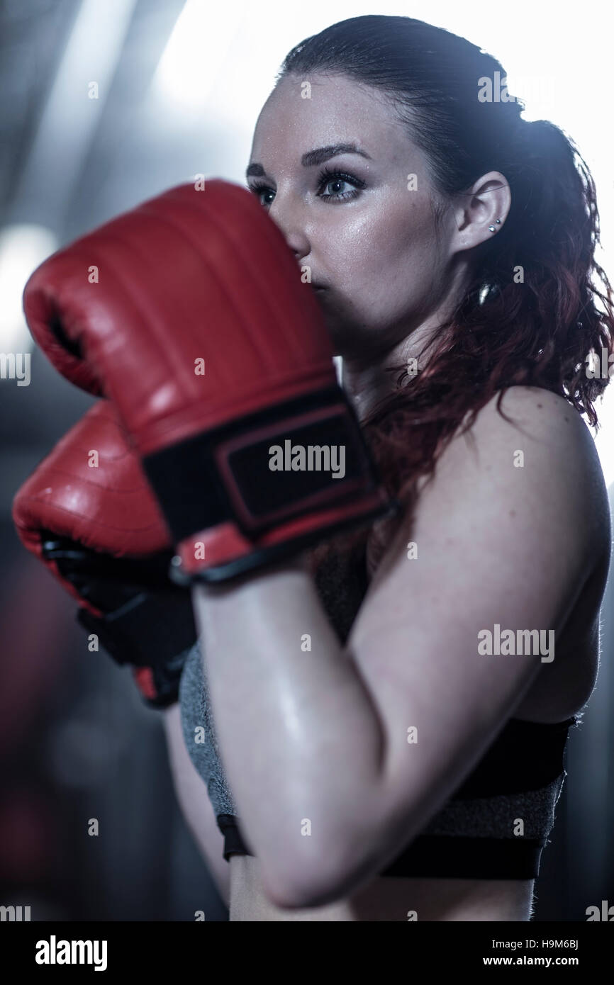 Female boxer practising in gym Stock Photo - Alamy