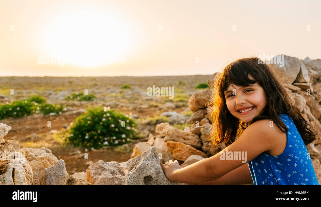 Portrait of happy little girl at sunset Stock Photo - Alamy