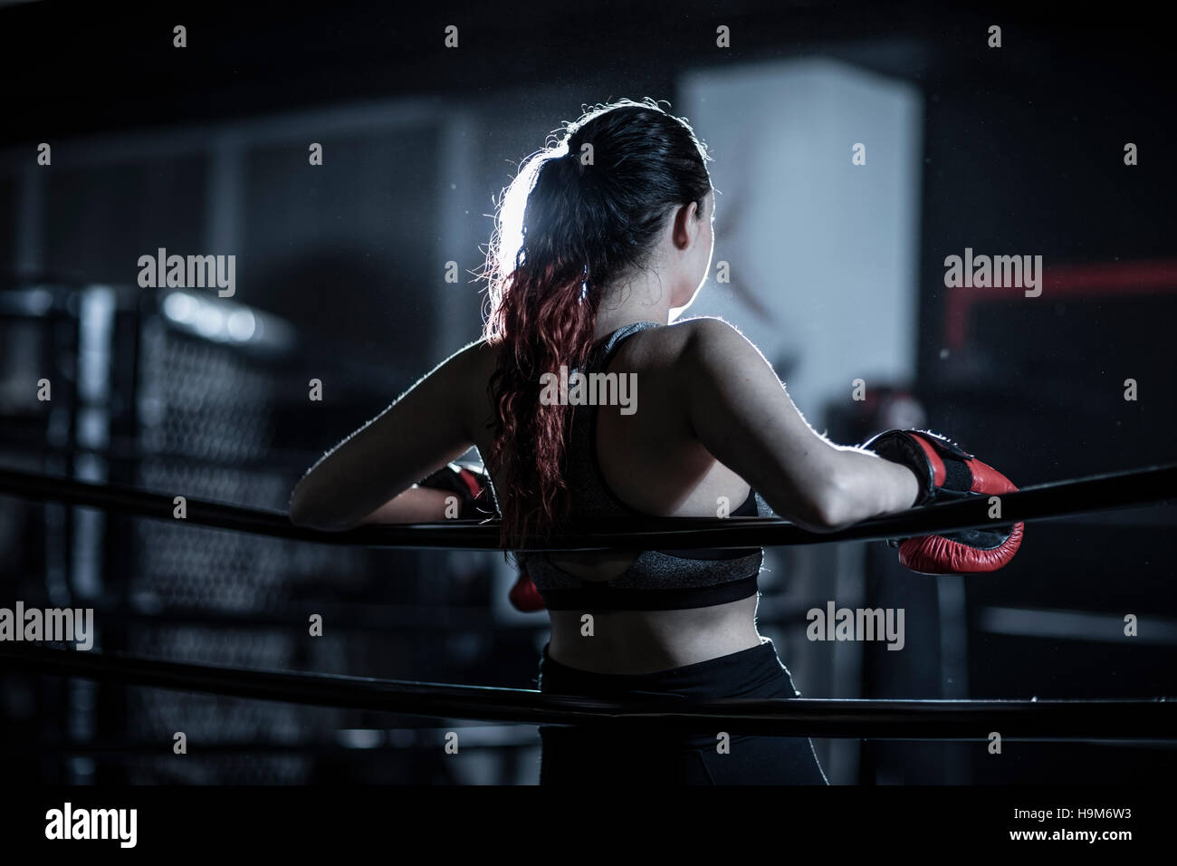 Female boxer in boxing ring Stock Photo - Alamy