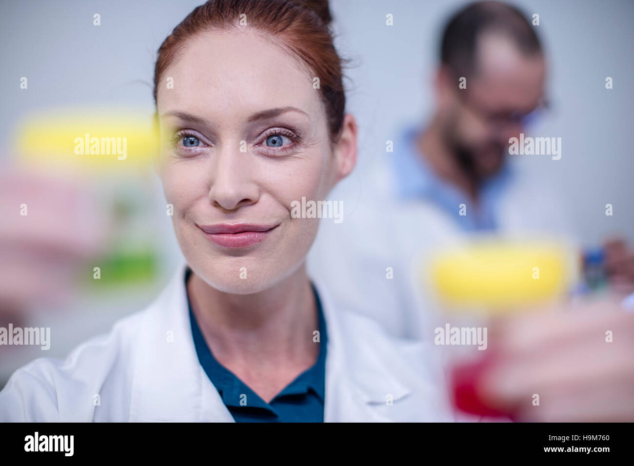 Smiling woman in lab Stock Photo - Alamy