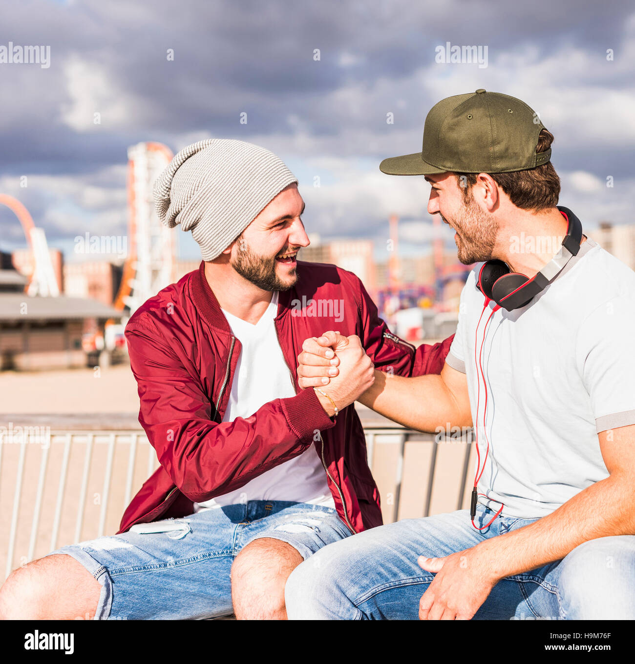 USA, New York City, two friends meeting on Coney Island Stock Photo - Alamy