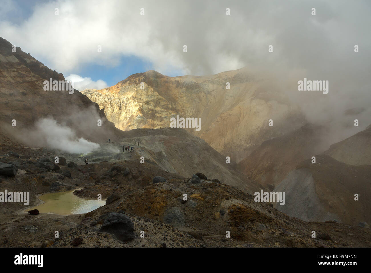 Climbing to active volcano Mutnovsky on Kamchatka Stock Photo - Alamy
