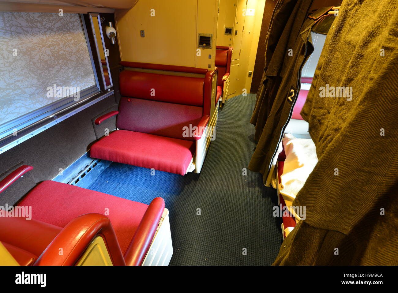 The seats inside of a vintage American railway carriage Stock Photo - Alamy