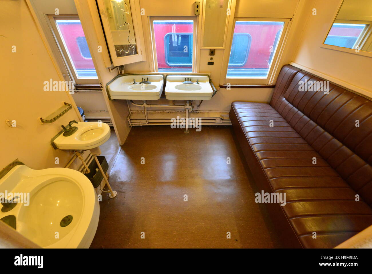 The seats inside of a vintage American railway carriage Stock Photo - Alamy