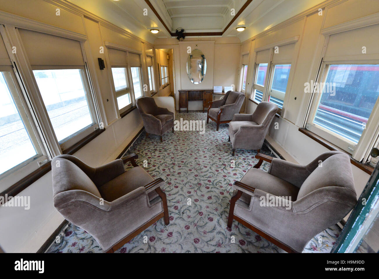 The seats inside of a vintage American railway carriage Stock Photo - Alamy
