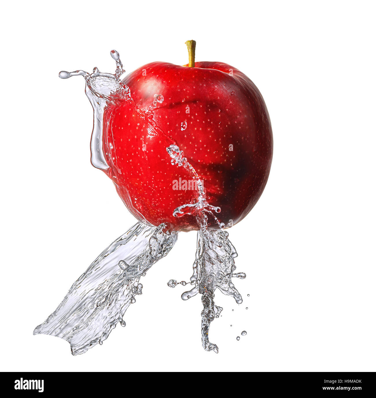 Water splash with apple isolated Stock Photo - Alamy