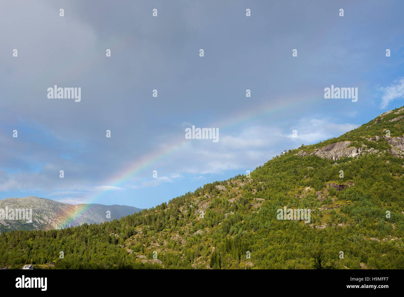 rainbow over the mountains of Norway Stock Photo - Alamy