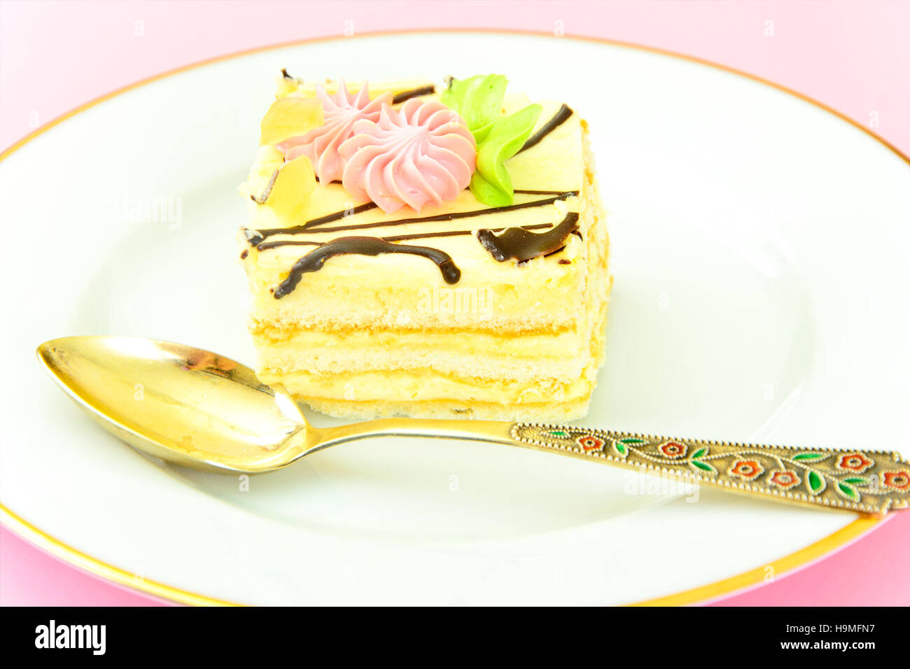 Sweets: Cream Cakes on Plate Stock Photo - Alamy