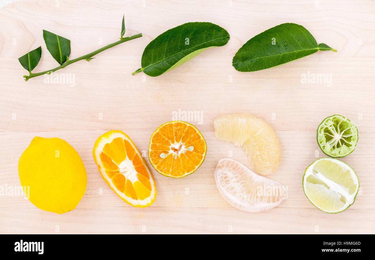 Mixed citruses fruit oranges, pomelo , lemon and lime on wooden Stock ...