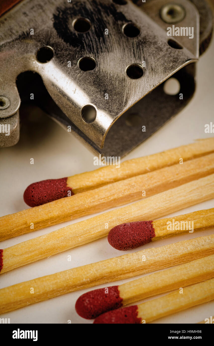 Used retro lighter and matches in a studio shot still life Stock Photo ...