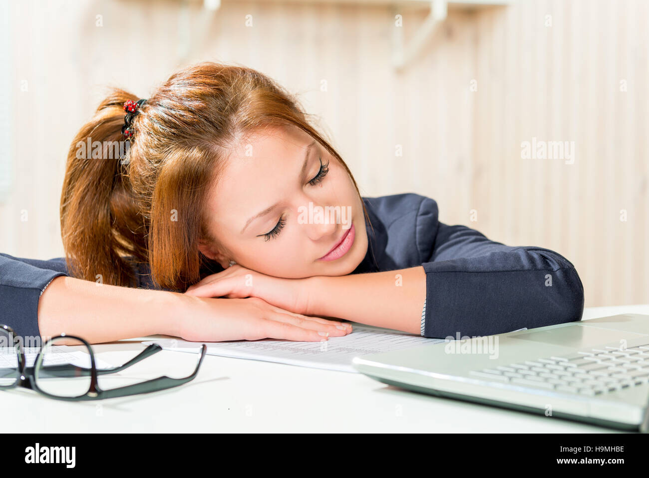 tired business woman asleep at his desk, close-up portrait Stock Photo ...