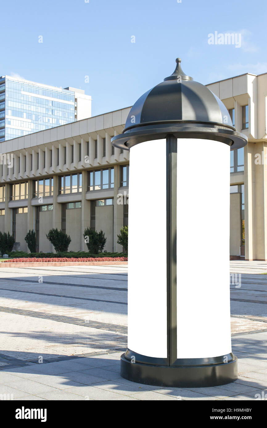 Mockup street advertising or information column stand on sidewalk Stock ...