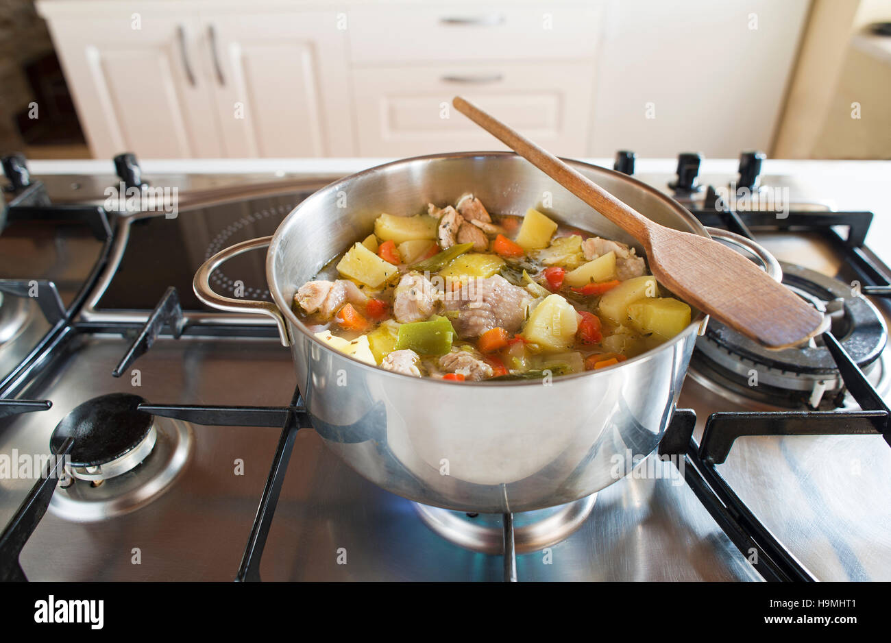 Stewing meat stove hi-res stock photography and images - Alamy