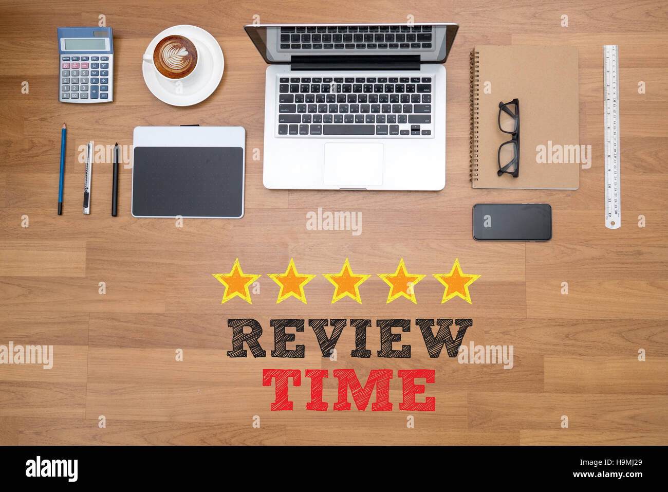 Review Time words, Businessman working Stock Photo - Alamy
