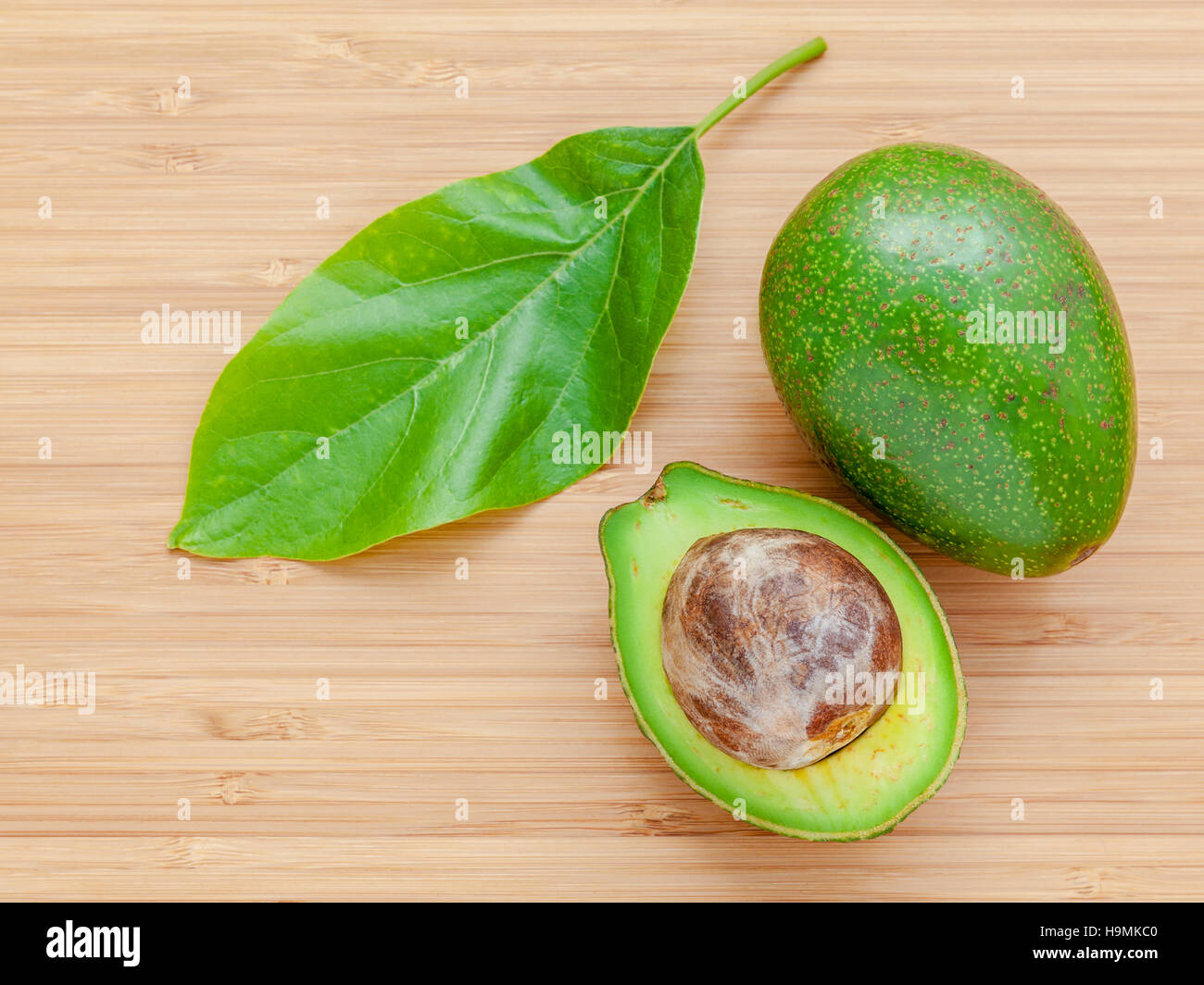 Fresh avocado on wooden background. Organic avocado healthy food Stock ...