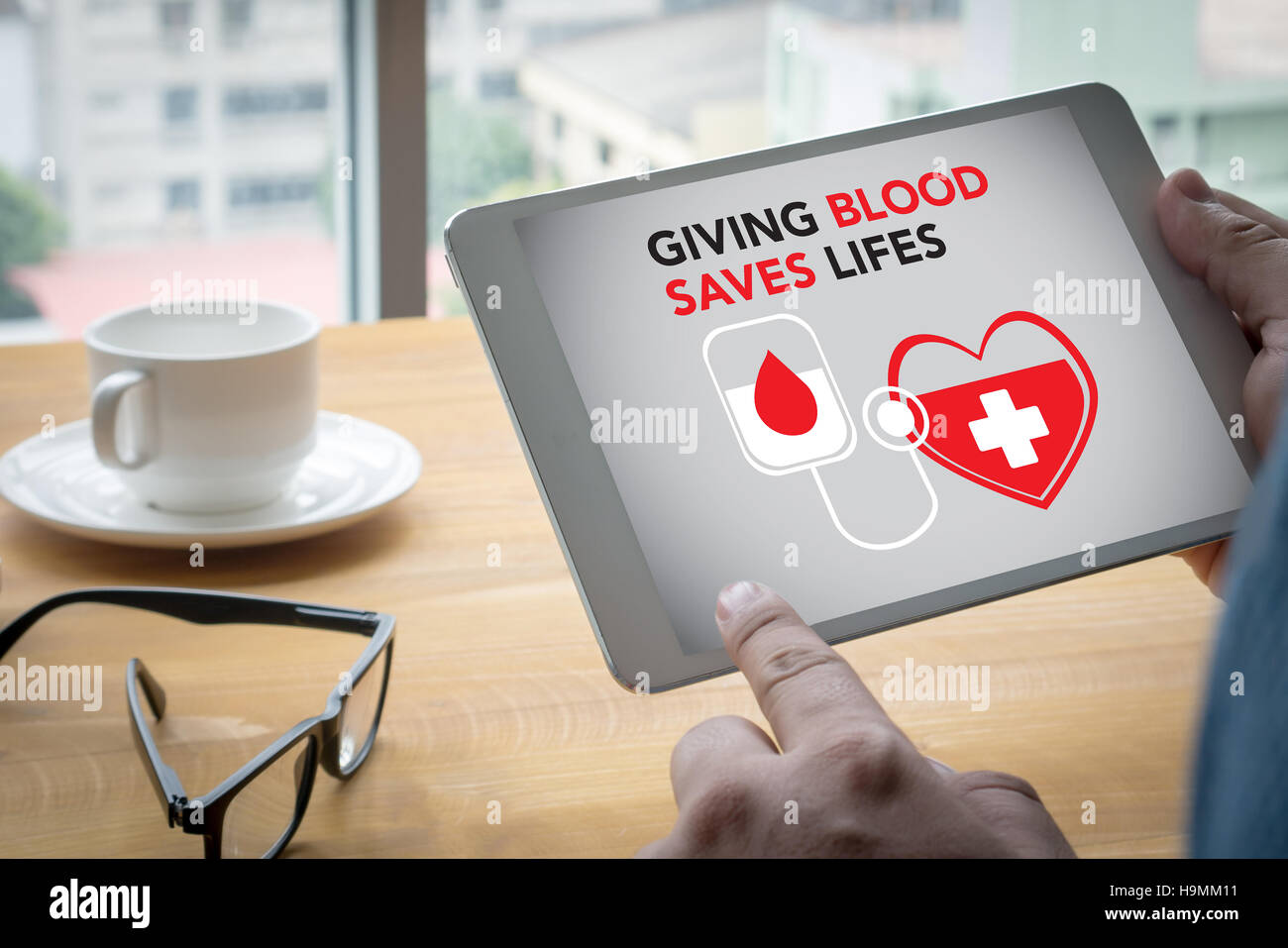 GIVING BLOOD SAVES LIFES Blood Donation Give Life Stock Photo - Alamy