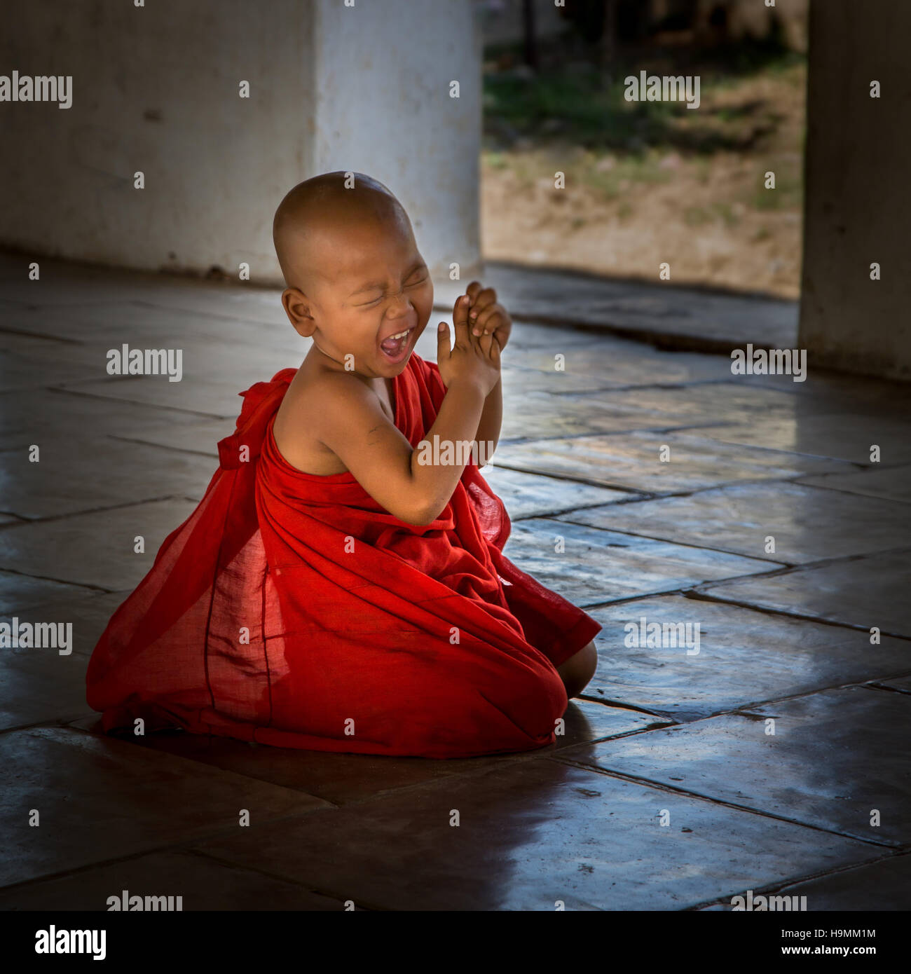 Monk laughing hi-res stock photography and images - Alamy