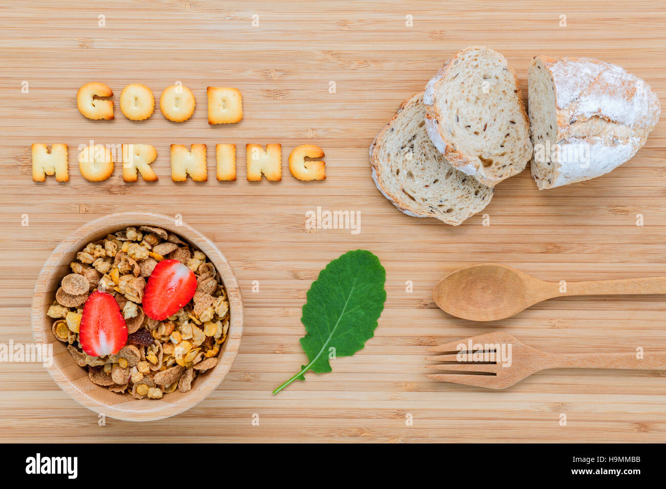 Good morning concept - Cereal in wooden bowl with strawberry and Stock ...