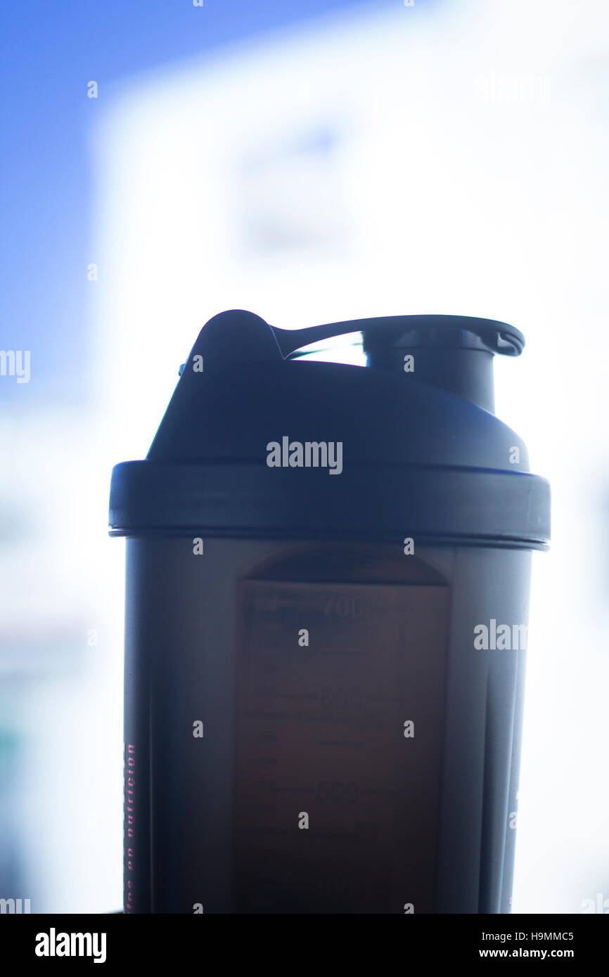 Protein shake shaker used to mix whey powder, glutamine, creatine and ...