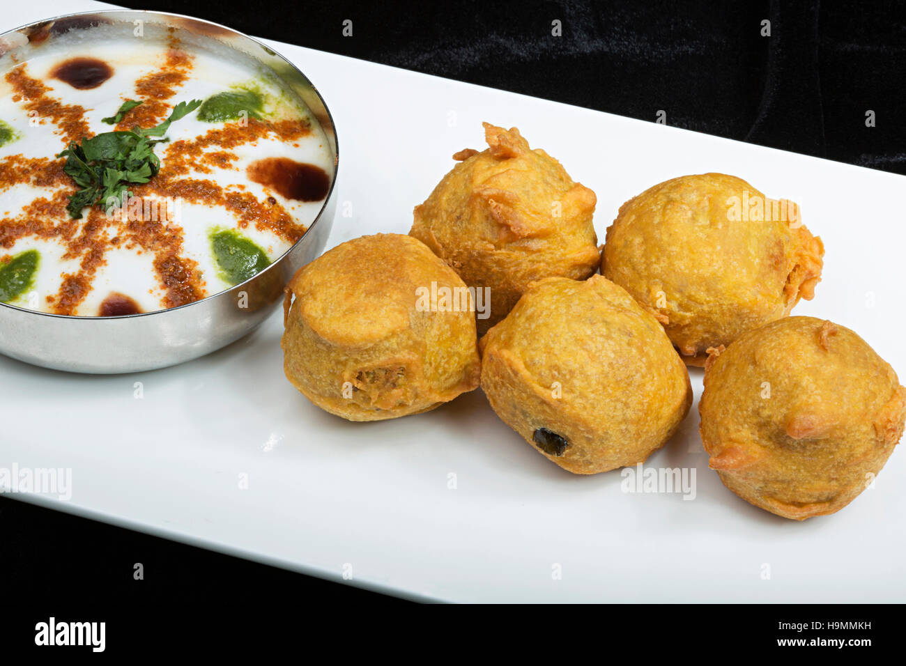 Popular Indian snack, Dahi Vada, Pune, India Stock Photo - Alamy