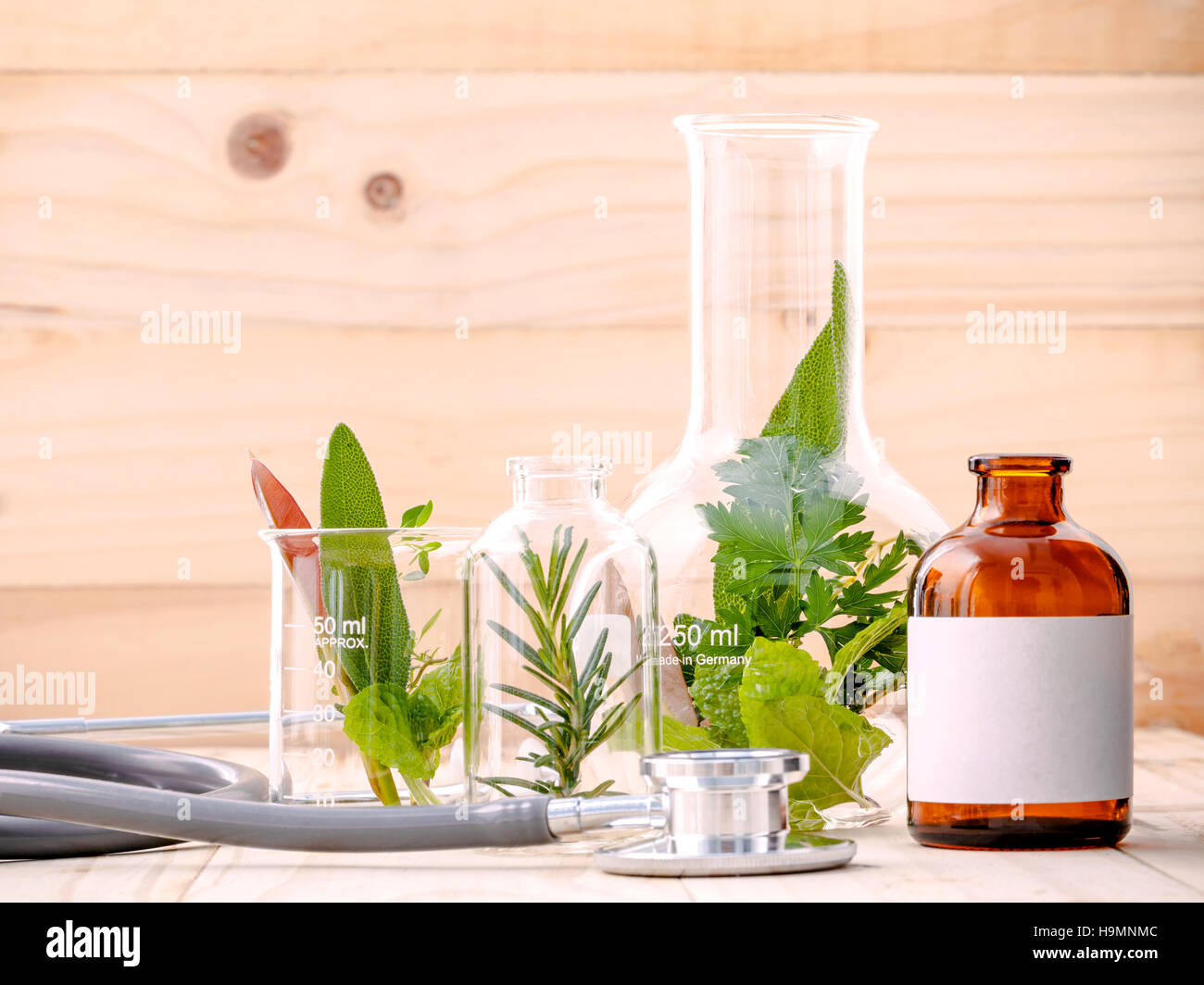 Alternative health care fresh herbal in laboratory glassware wi Stock ...
