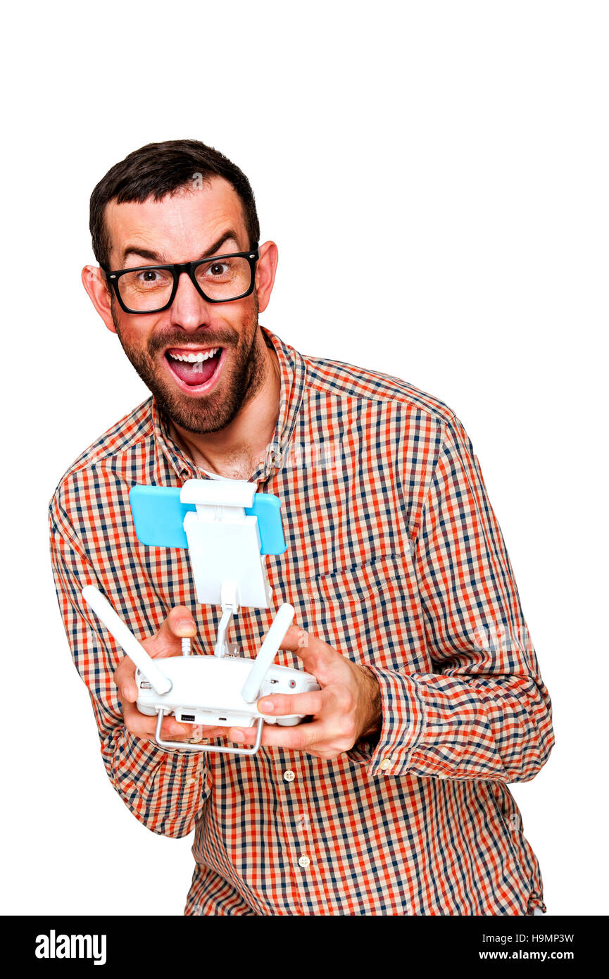 Man holding drone controler, isolated over white background verry happy ...