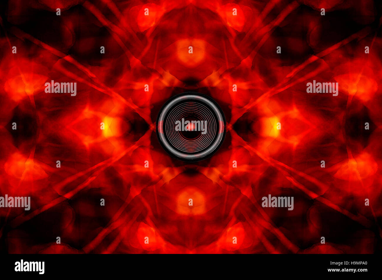 Music speaker on a groovy red kaleidoscope background Stock Photo - Alamy
