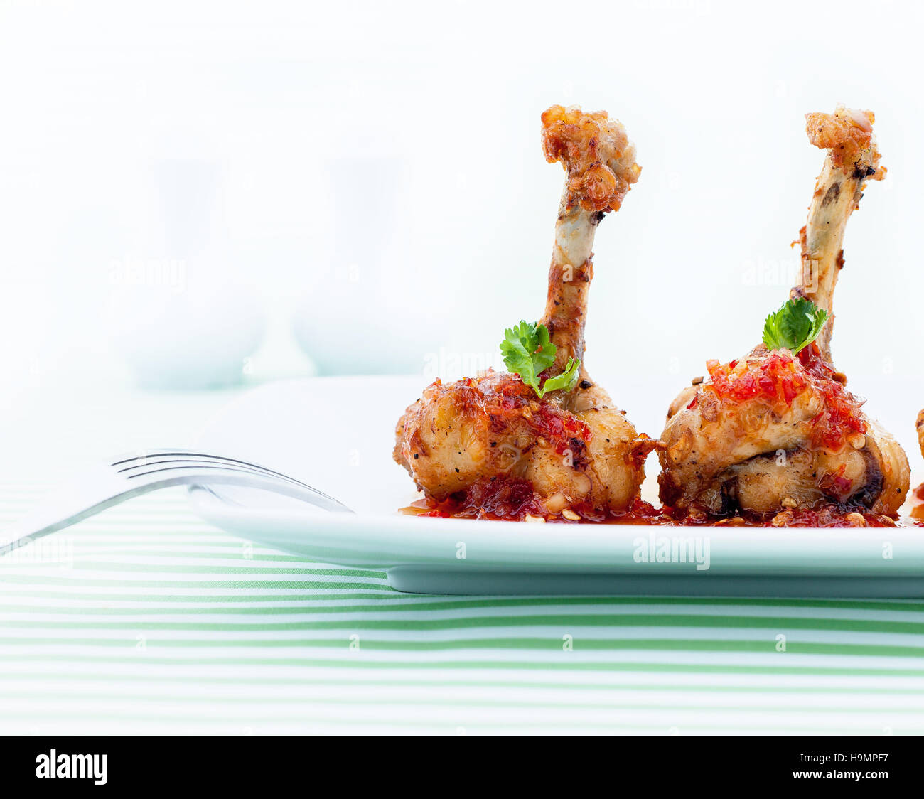 Chicken wings Dumping Stock Photo - Alamy