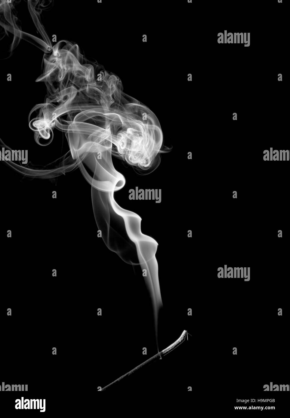 Abstract light smoke on a dark background Stock Photo - Alamy