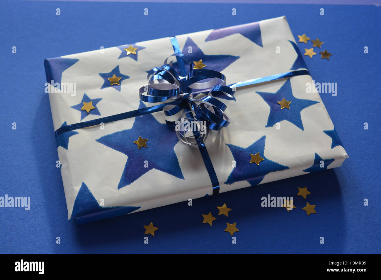 Wrapped up present hi-res stock photography and images - Alamy