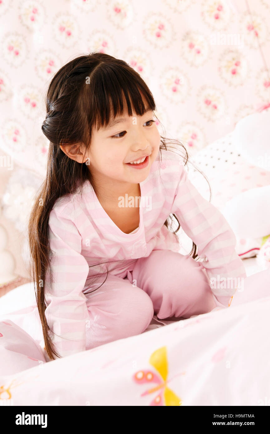 Cute little girl get up Stock Photo - Alamy
