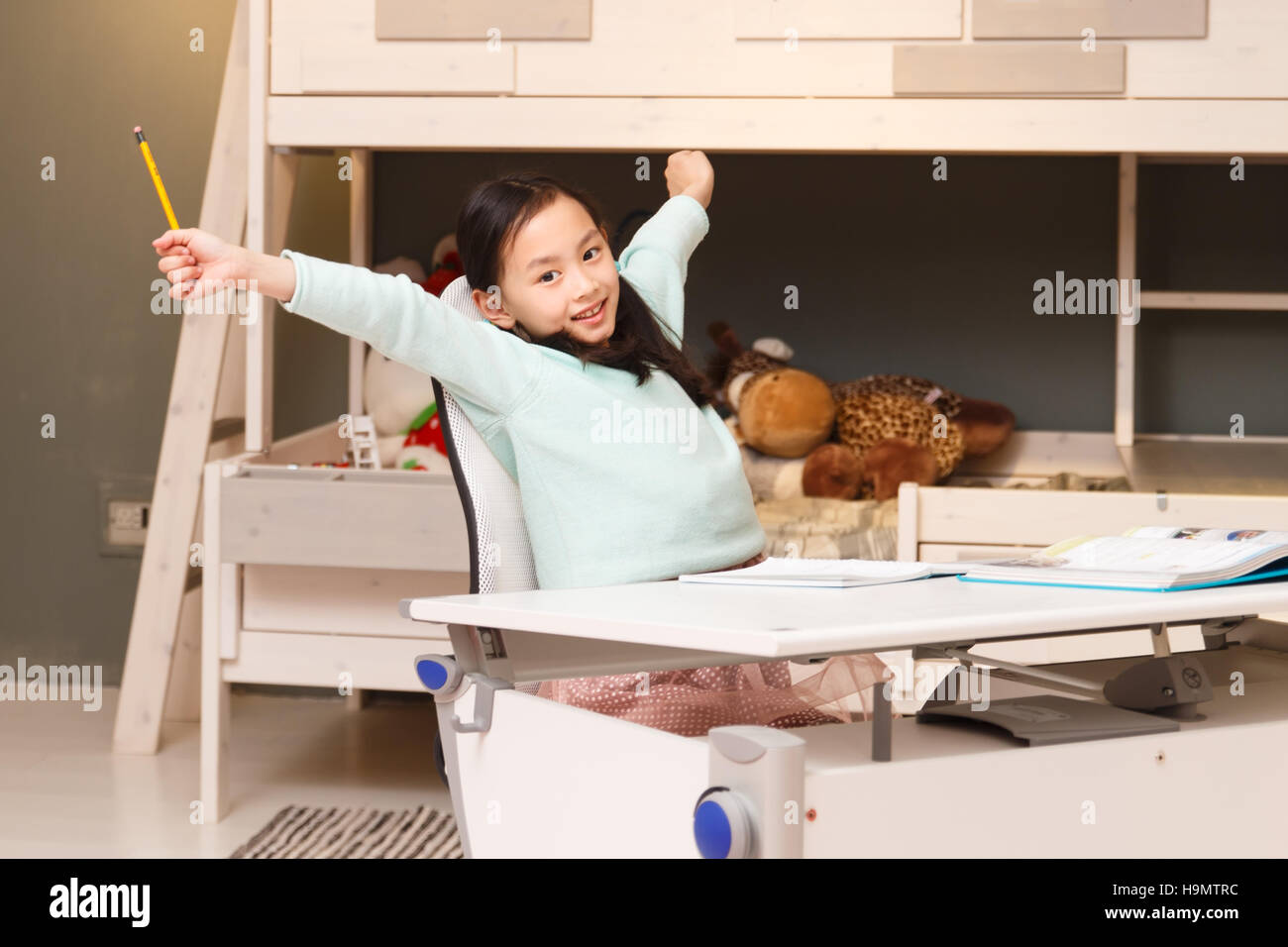 Little girl in learning Stock Photo - Alamy