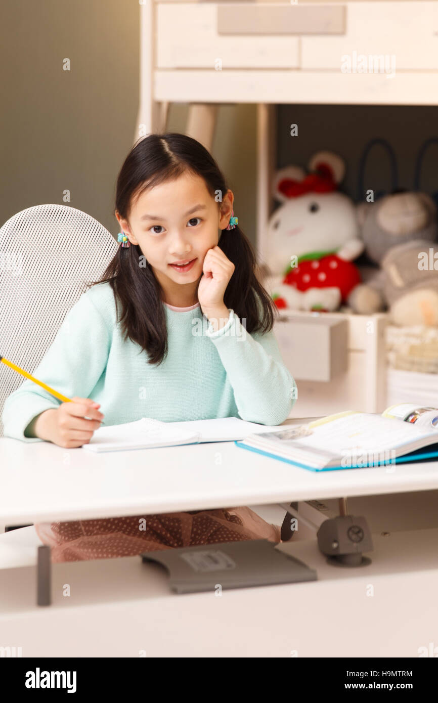 Little girl in learning Stock Photo - Alamy
