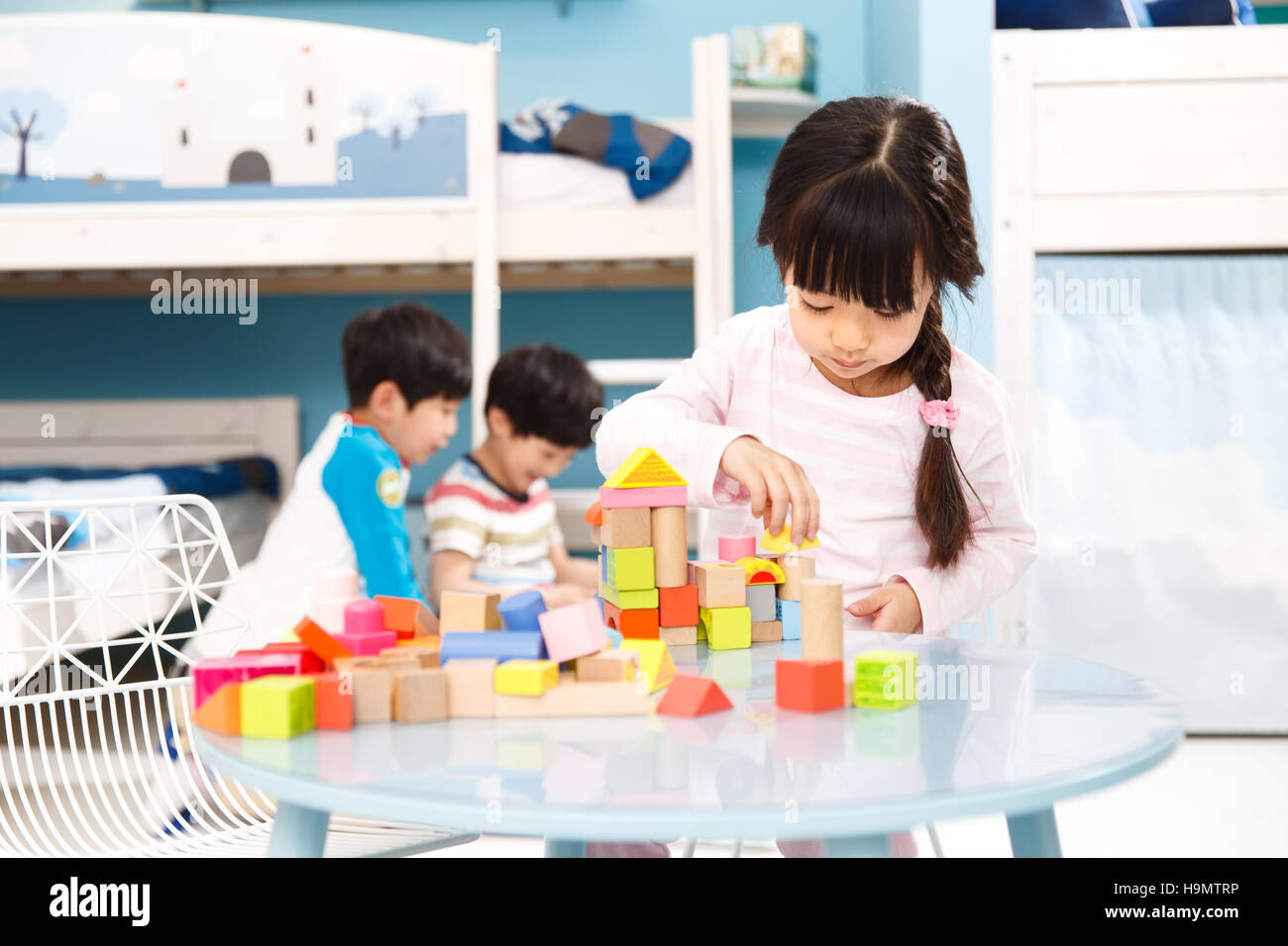 Happy children play in the bedroom Stock Photo - Alamy