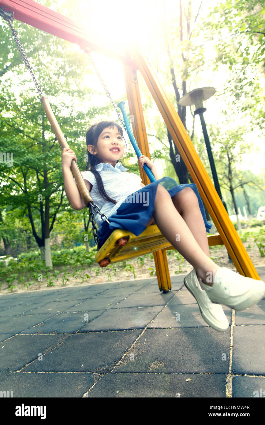 Little girl swing Stock Photo - Alamy Little girl swing Stock Photo - Alamy