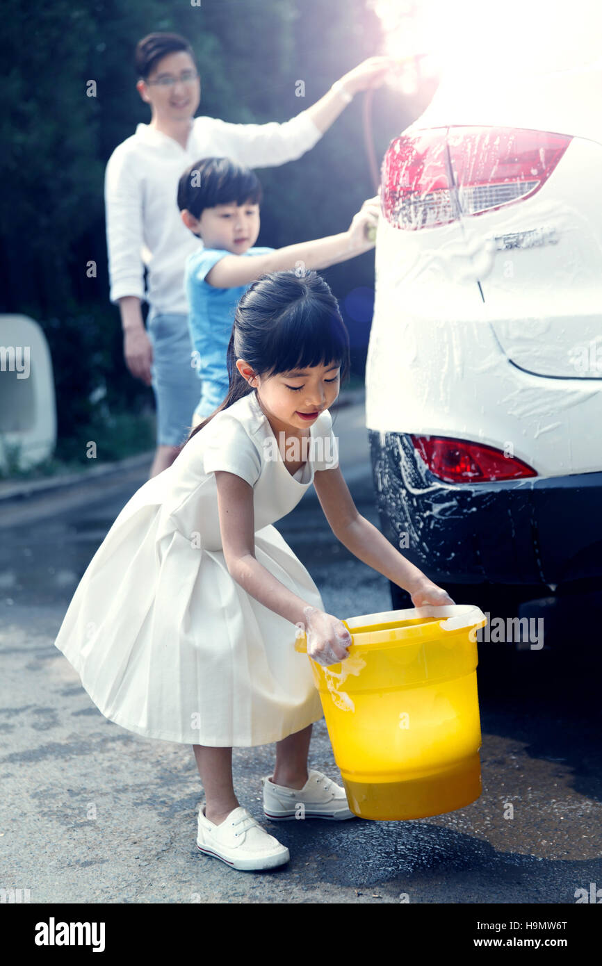 Happy home cleaning car Stock Photo - Alamy