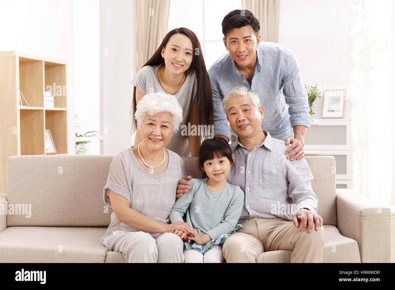 Happy family photo Stock Photo - Alamy