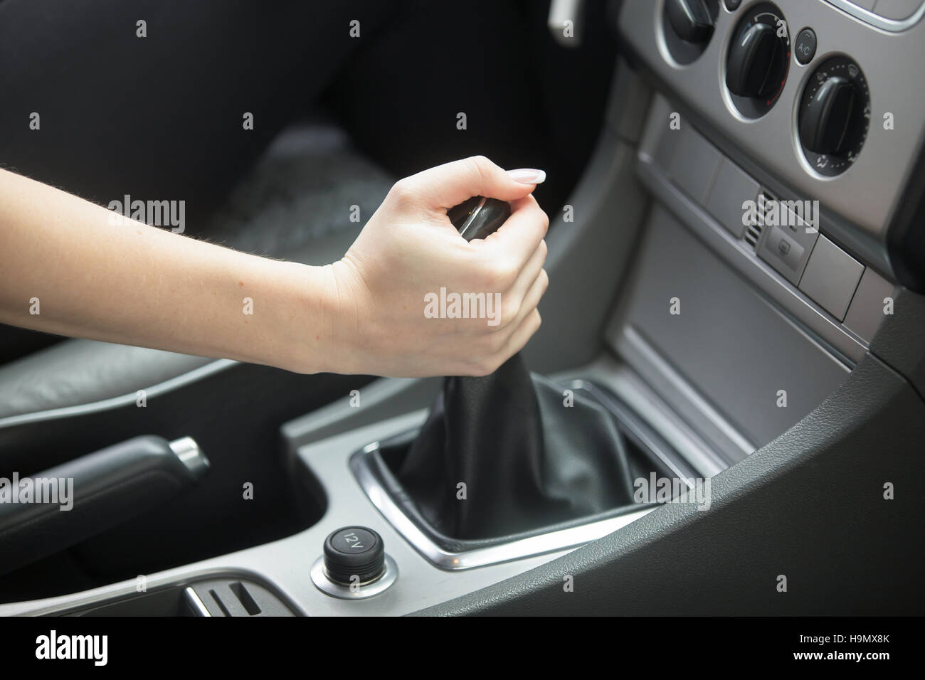 Car radio female hand hi-res stock photography and images - Alamy
