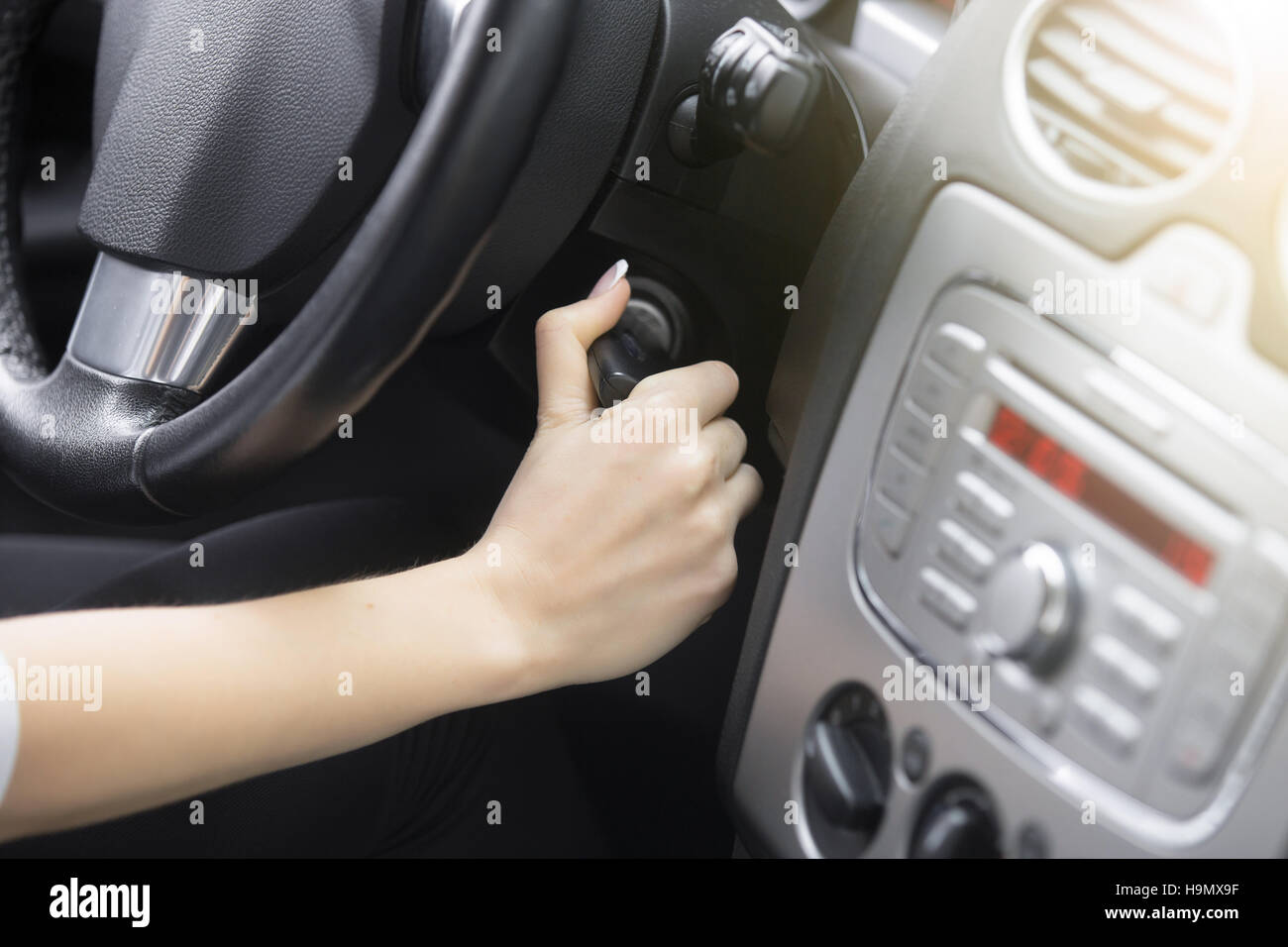 Close-up of female hand adjusting a rear-view mirror Stock Photo - Alamy