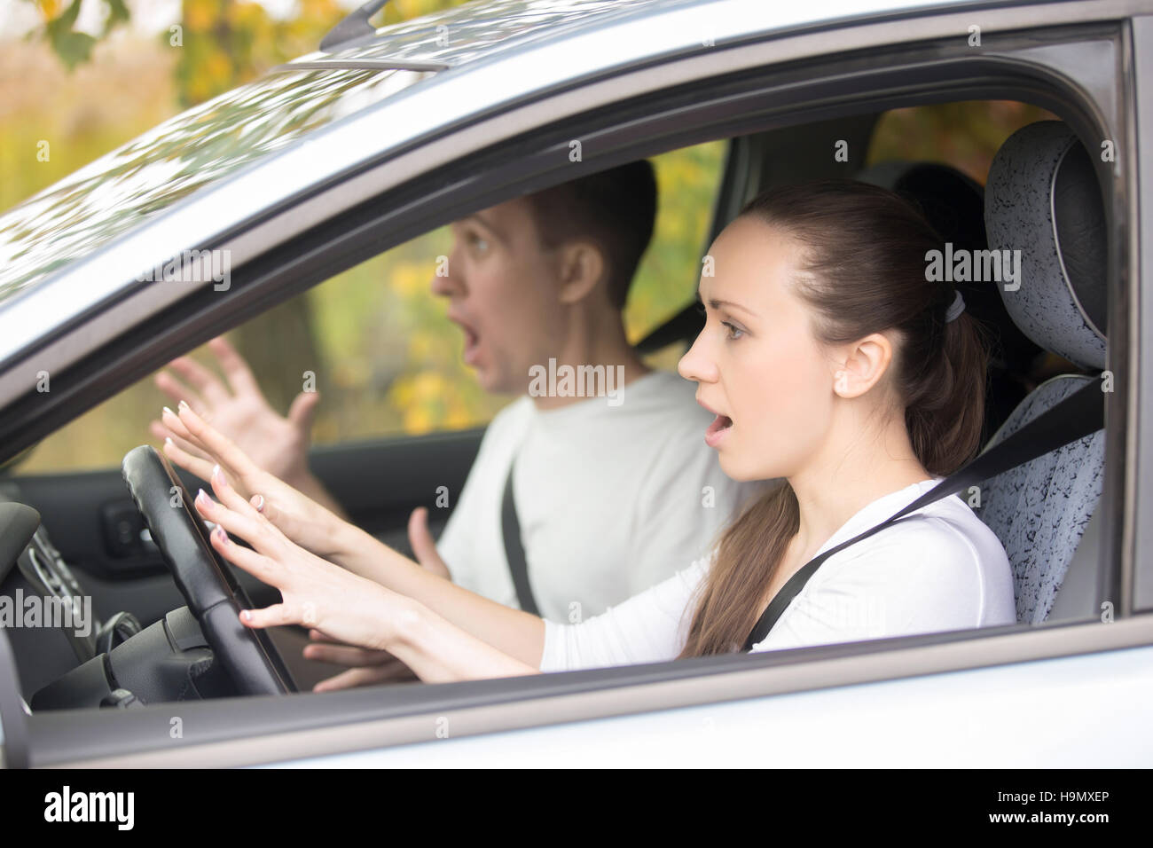 Man driving woman scared hi-res stock photography and images - Alamy