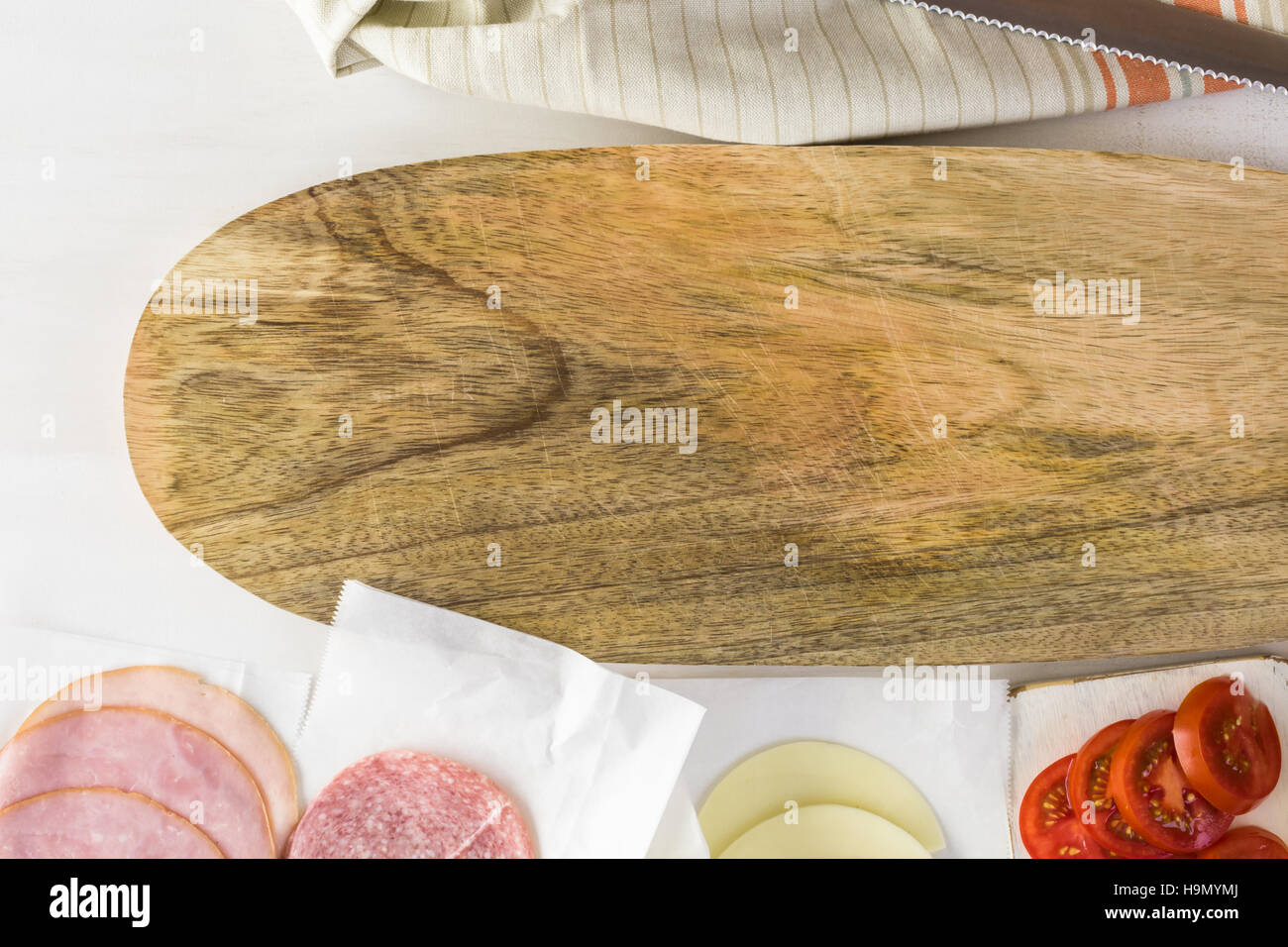 Step by step. Fresh sub sandwich on white and wheat hoagies Stock Photo ...