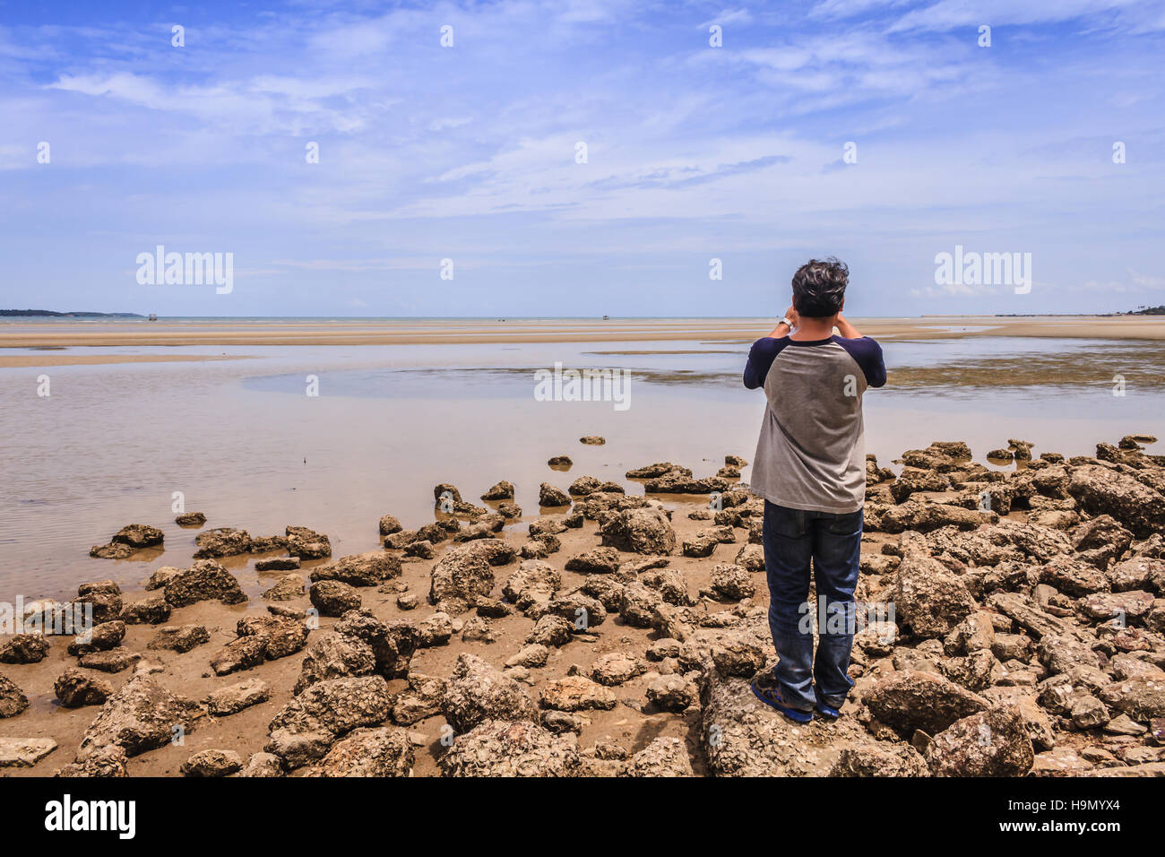 Man On Seashore Stock Photo - Alamy