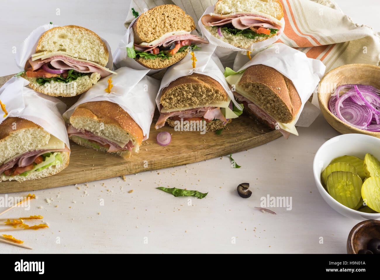 Fresh sub sandwich on white and wheat hoagies Stock Photo - Alamy