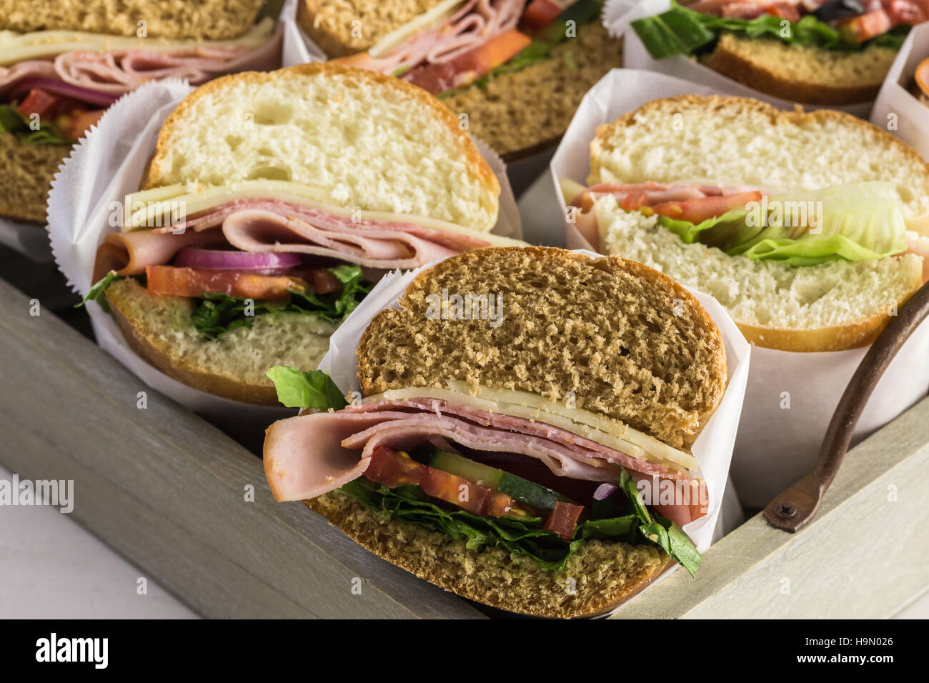 Fresh sub sandwich on white and wheat hoagies Stock Photo - Alamy
