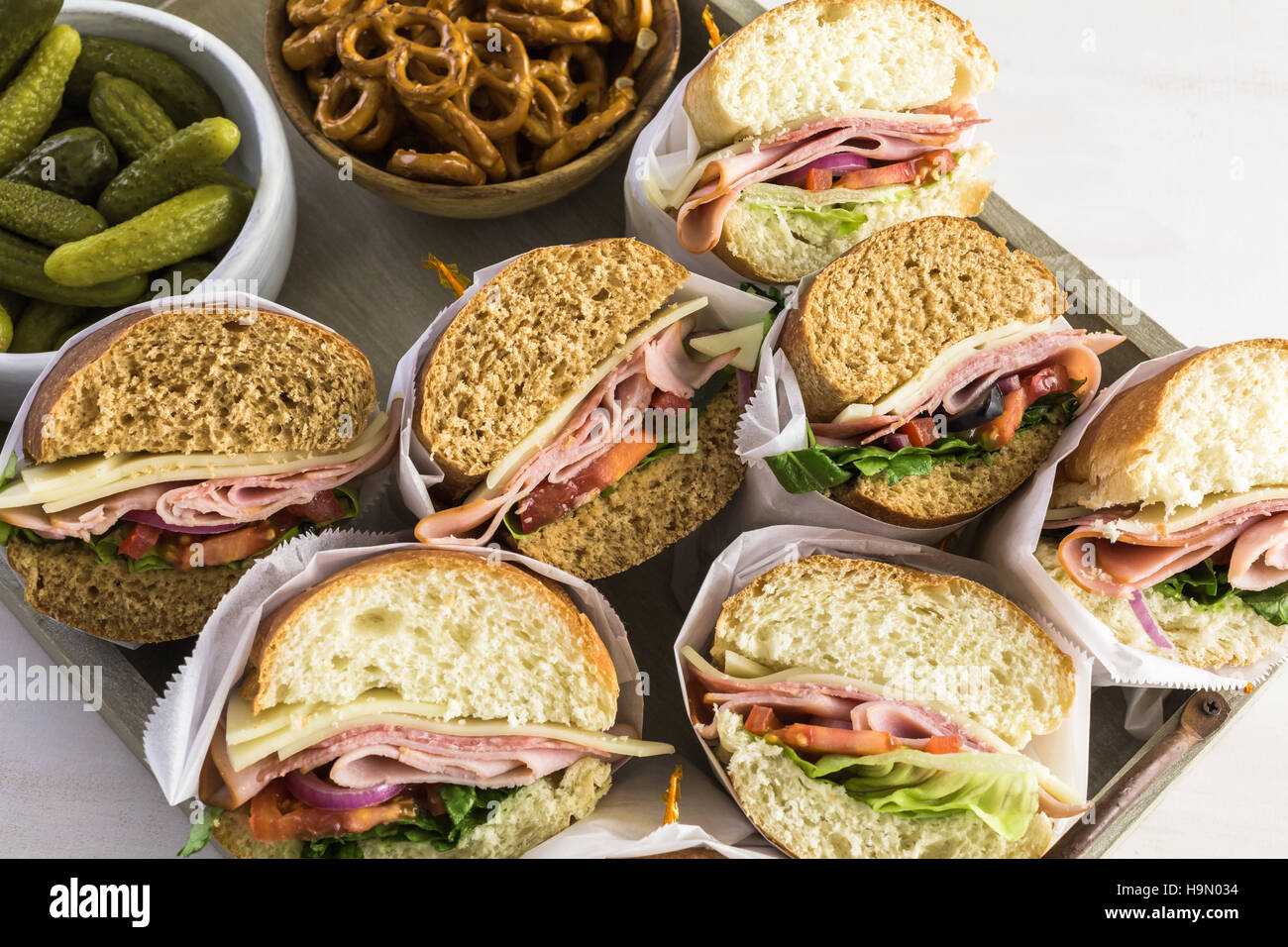 Fresh sub sandwich on white and wheat hoagies Stock Photo - Alamy