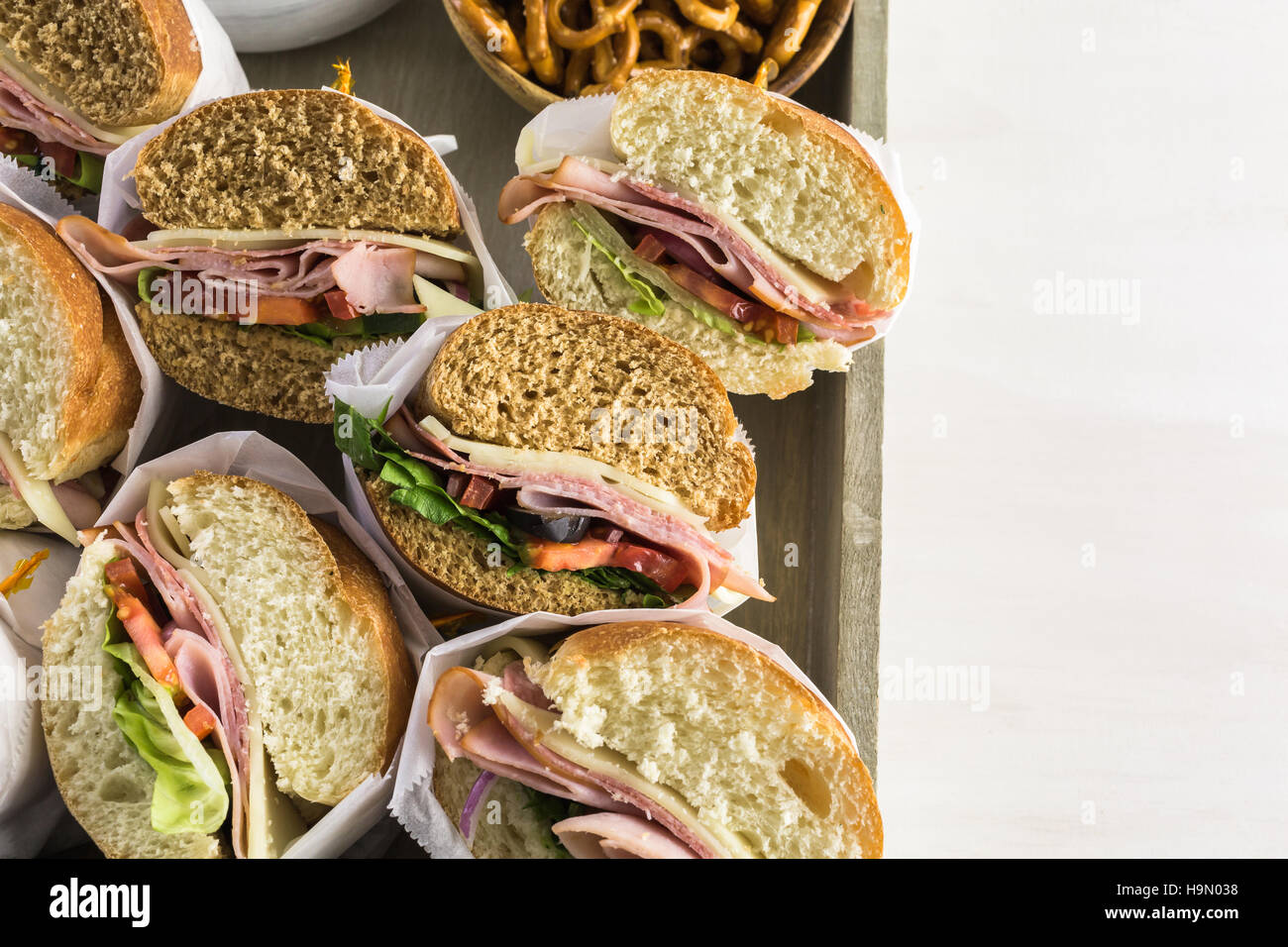 Fresh sub sandwich on white and wheat hoagies Stock Photo - Alamy