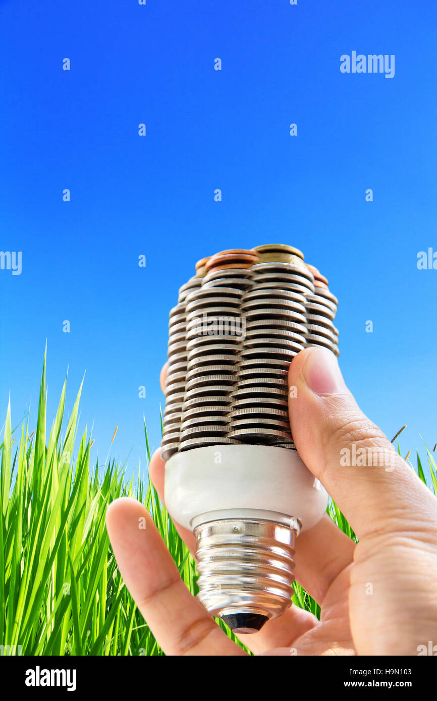hand holding eco light bulb Stock Photo - Alamy